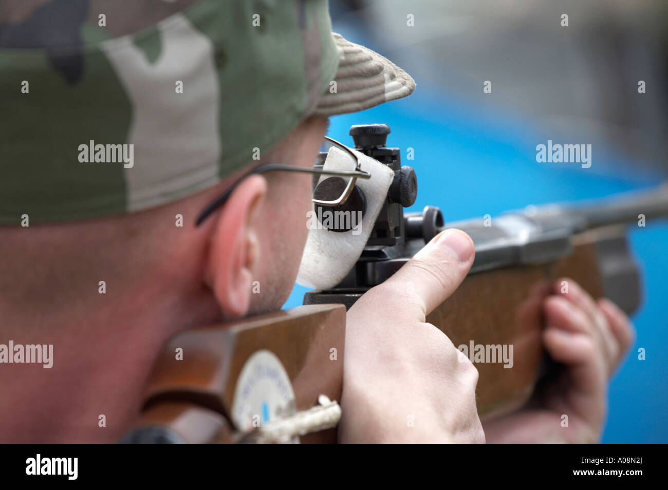 man firing a rifle in Poland Stock Photo - Alamy