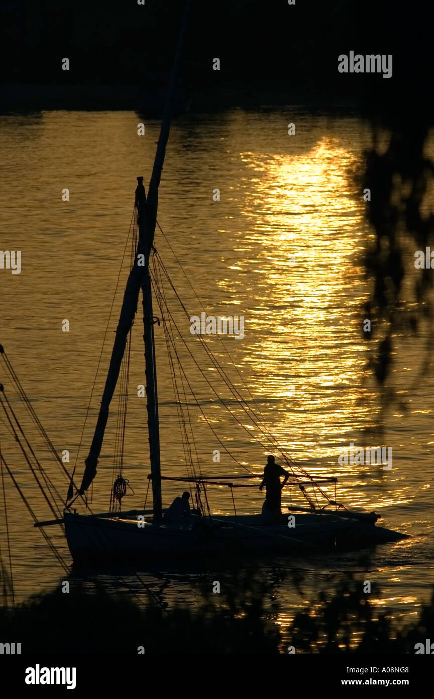 A felucca, the traditional Nile boat on the Nile river at sunset, Luxor ...