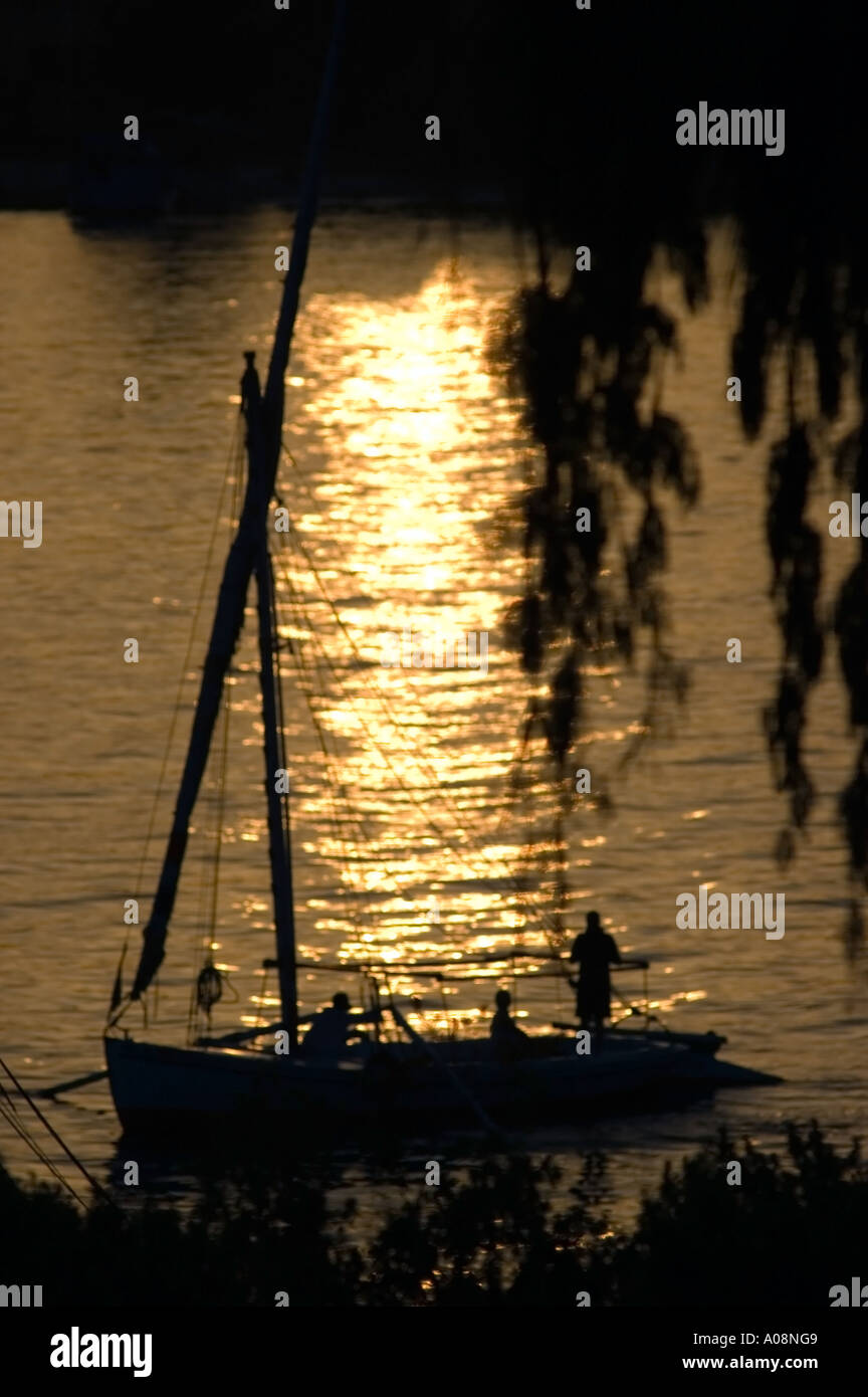 A felucca, the traditional Nile boat on the Nile river at sunset, Luxor ...