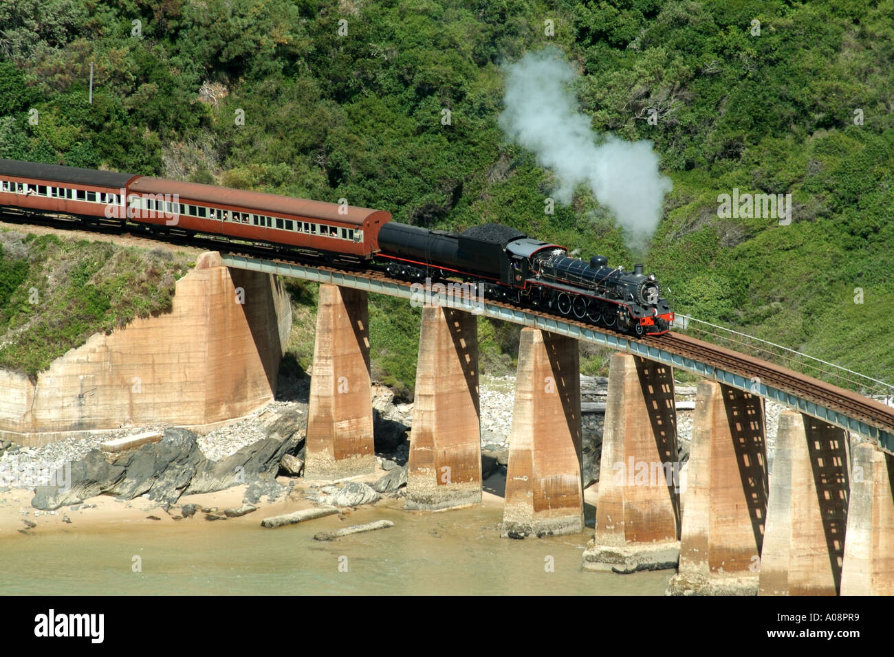 The Outeniqua Choo Tjoe steam train on the Kaaimans River Bridge near ...