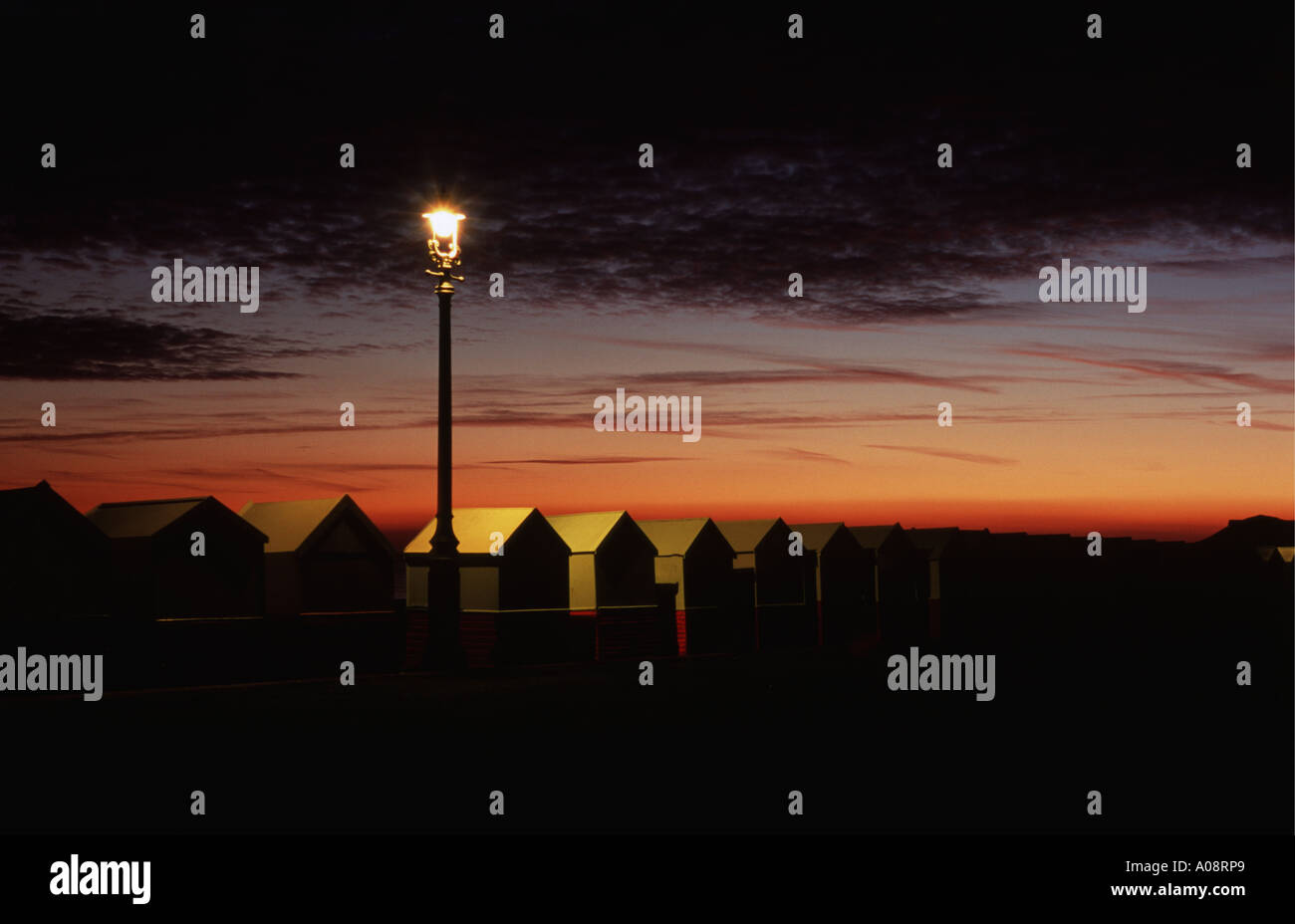 Brighton beach huts sunset hi-res stock photography and images - Alamy