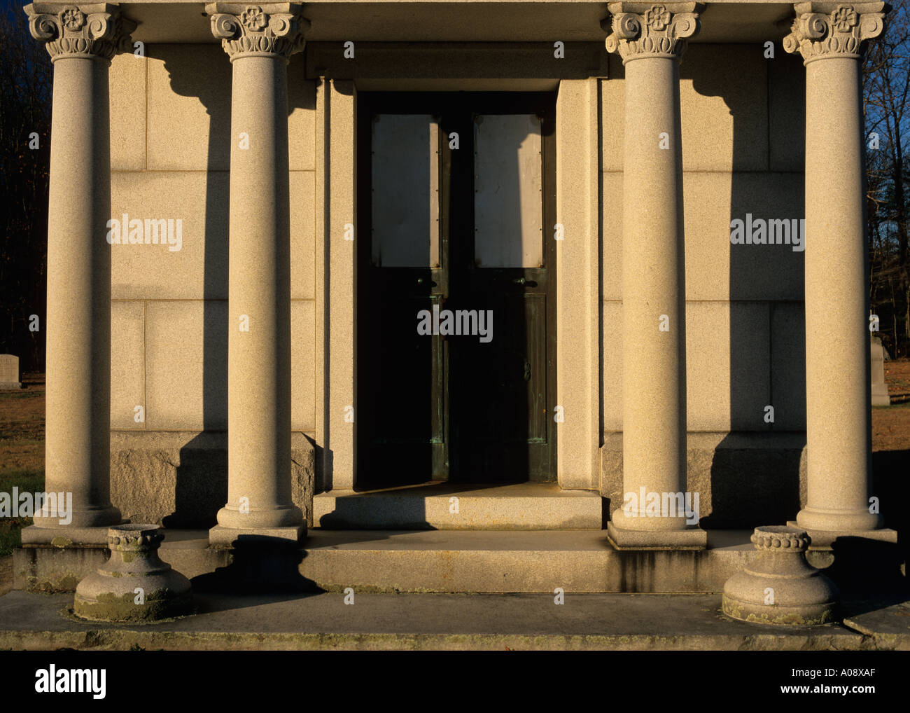 Above ground tomb with four pillars in an New England Graveyard pillars ...