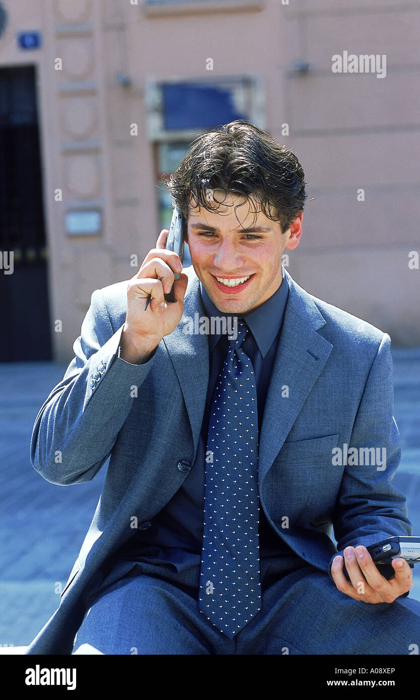 Technology holding mobile telecommunications talking businessman hi-res ...