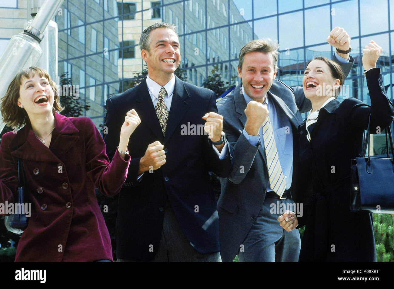 Three businessmen cheering hi-res stock photography and images - Alamy