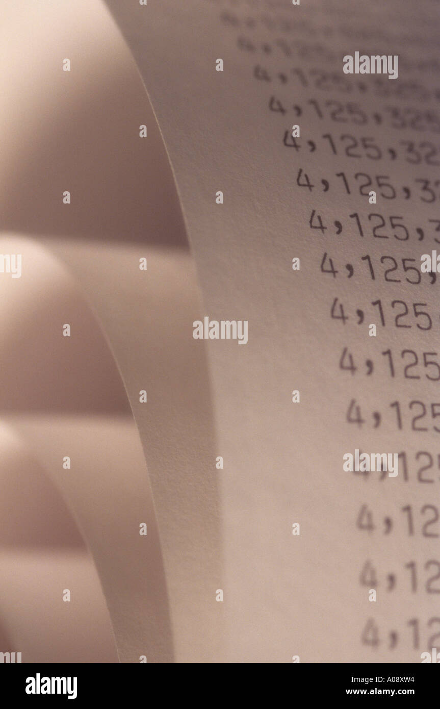 Adding machine tape abstract spiraling endless rows of large numbers ...