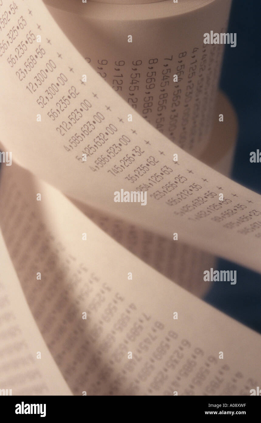 Adding machine tape abstract spiraling endless rows of large numbers ...