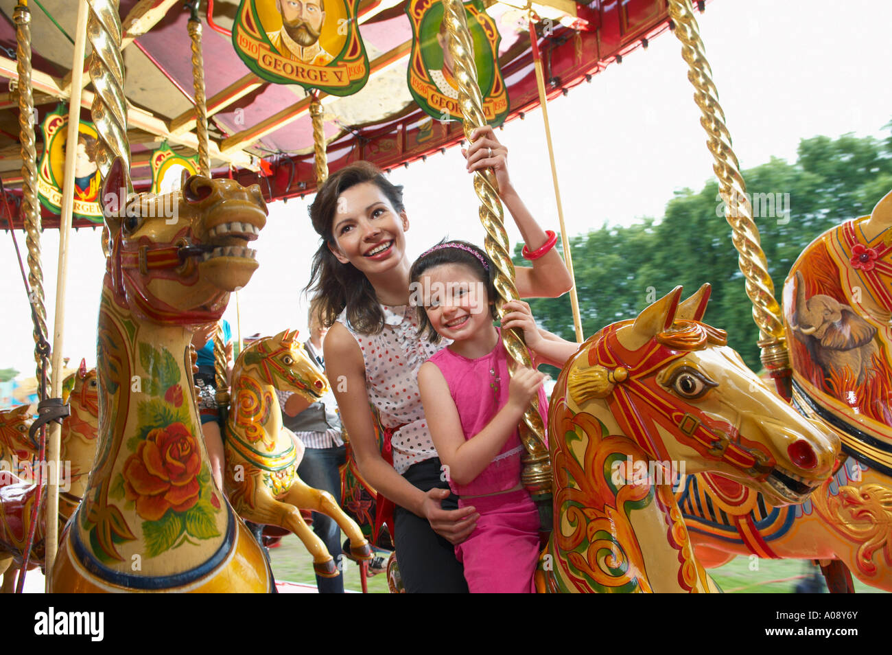 Girl Riding On Merry Go Round High Resolution Stock Photography and ...