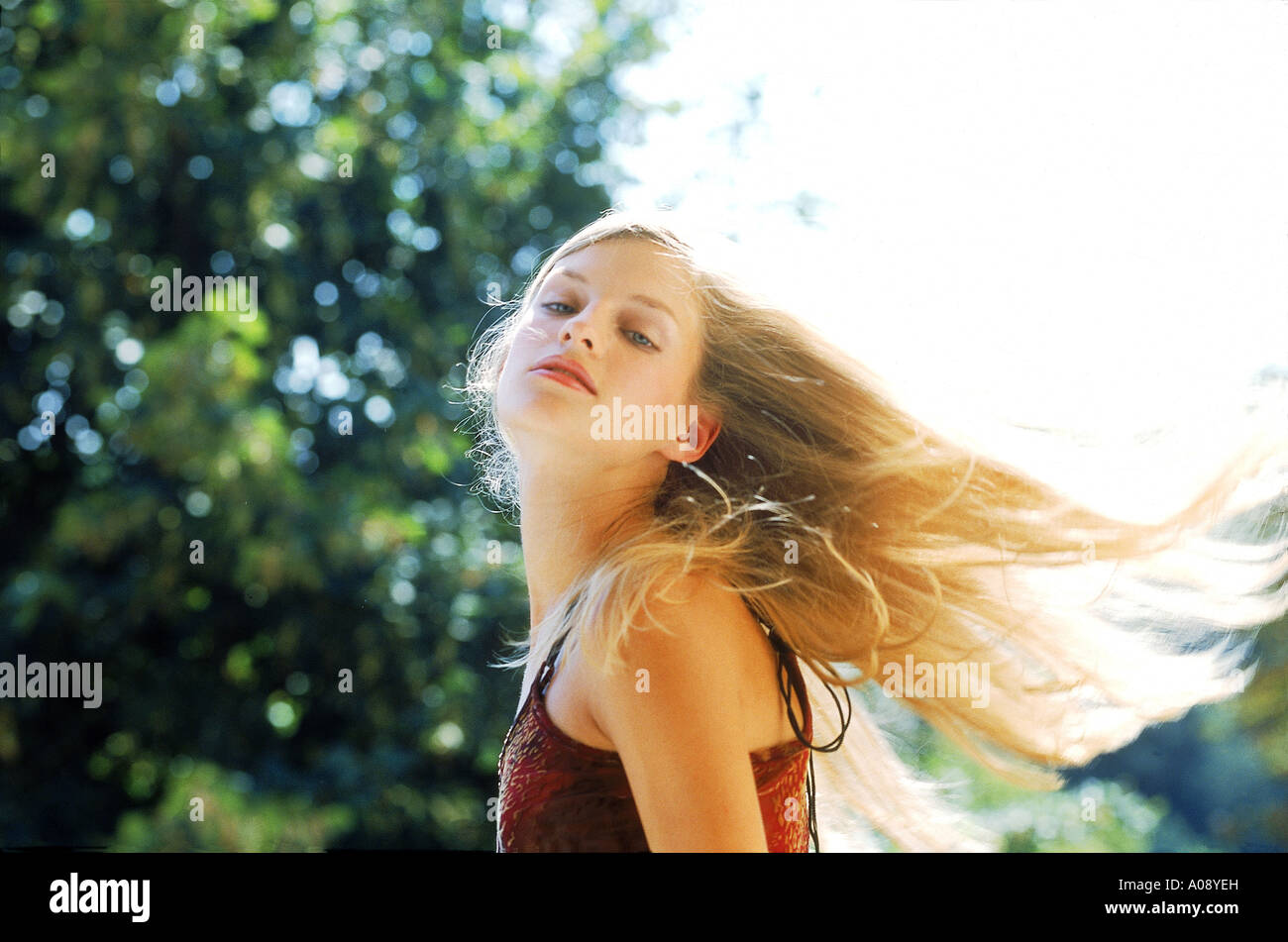 Side profile of a young woman Stock Photo - Alamy