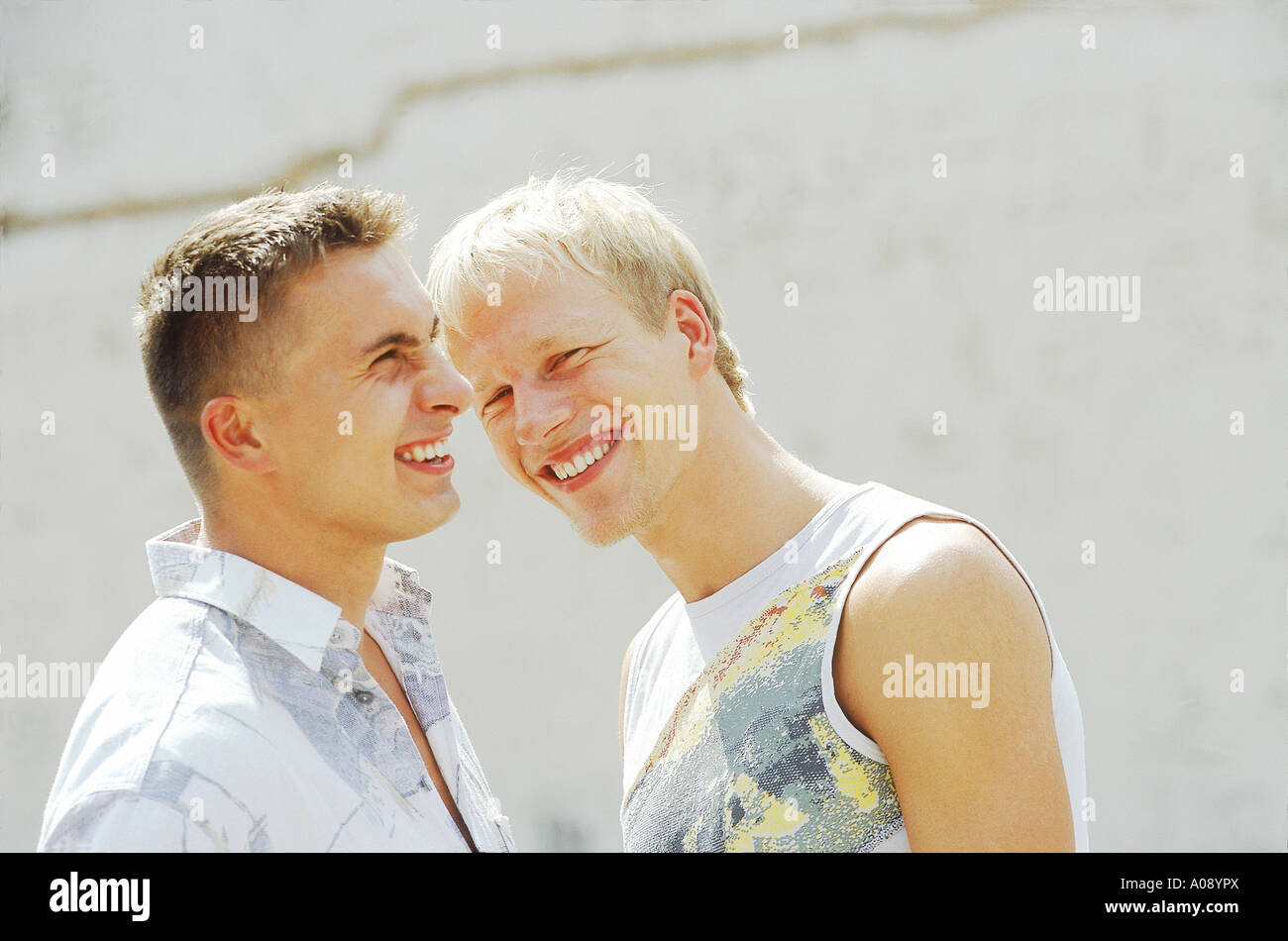 Two Young men smiling Stock Photo - Alamy