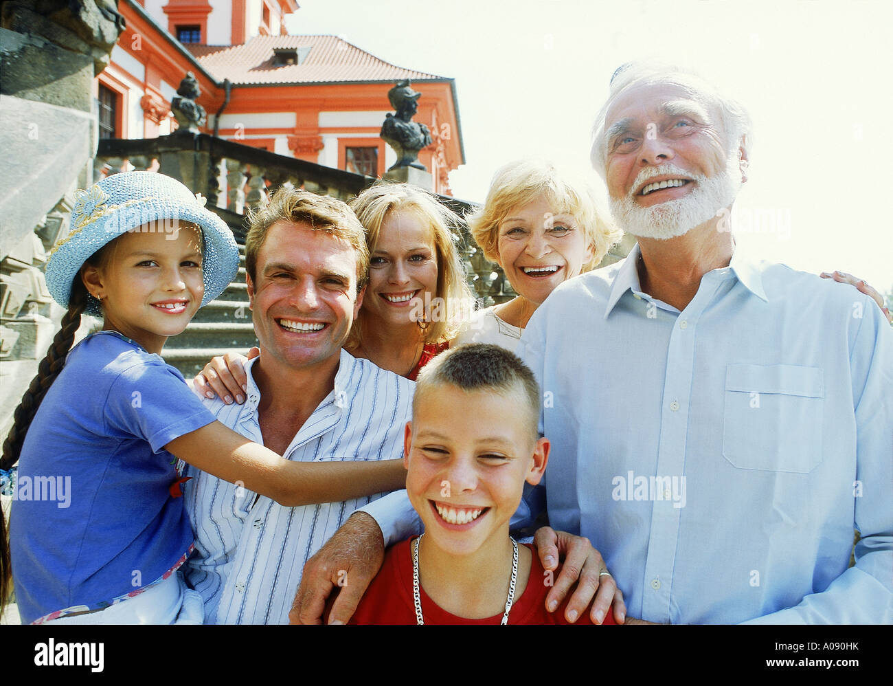 Portrait of a posing and smiling Stock Photo - Alamy