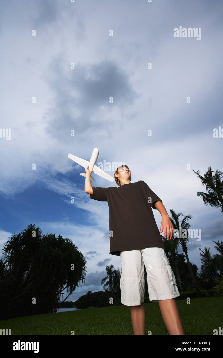 Teenage boy with model airplane hi-res stock photography and images - Alamy