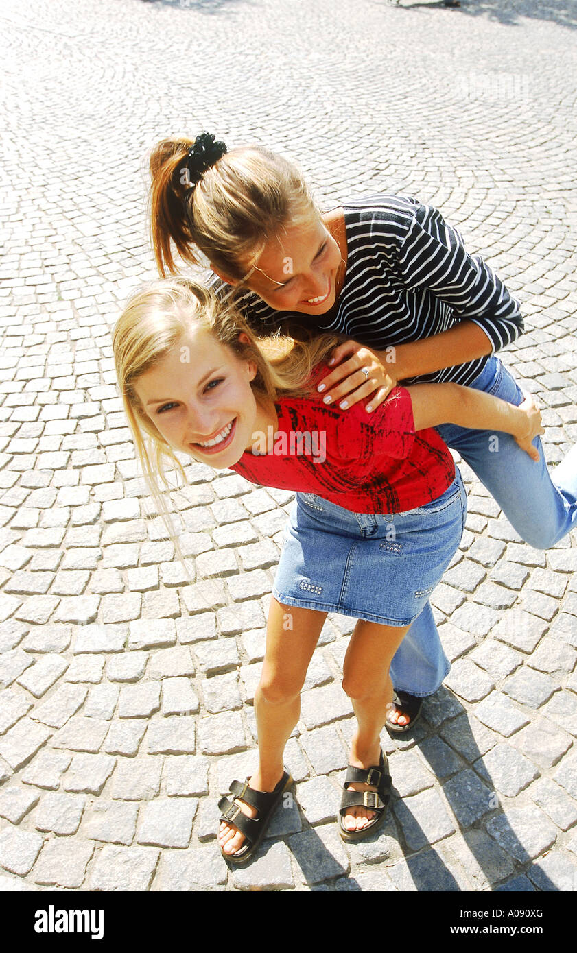 Two young women playing Stock Photo - Alamy