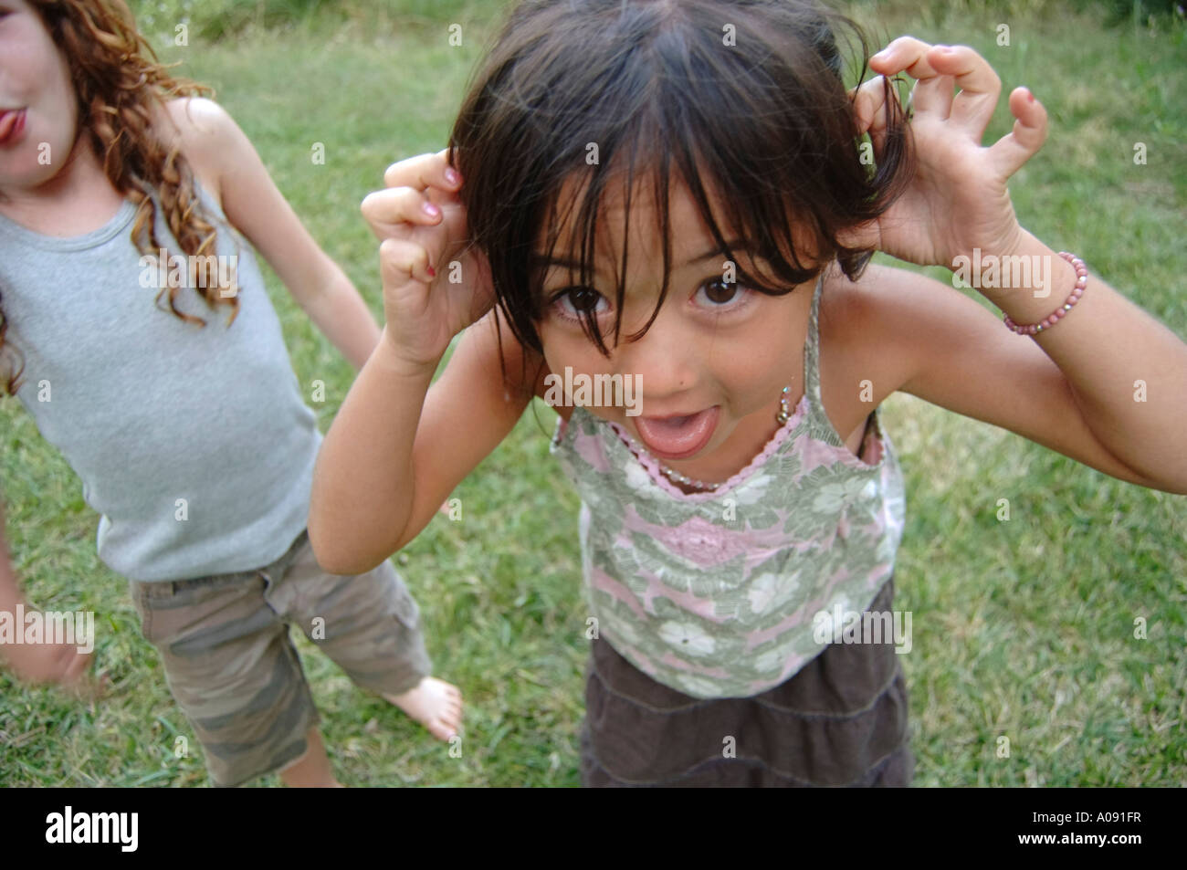 Girls Making Faces Stock Photo - Alamy