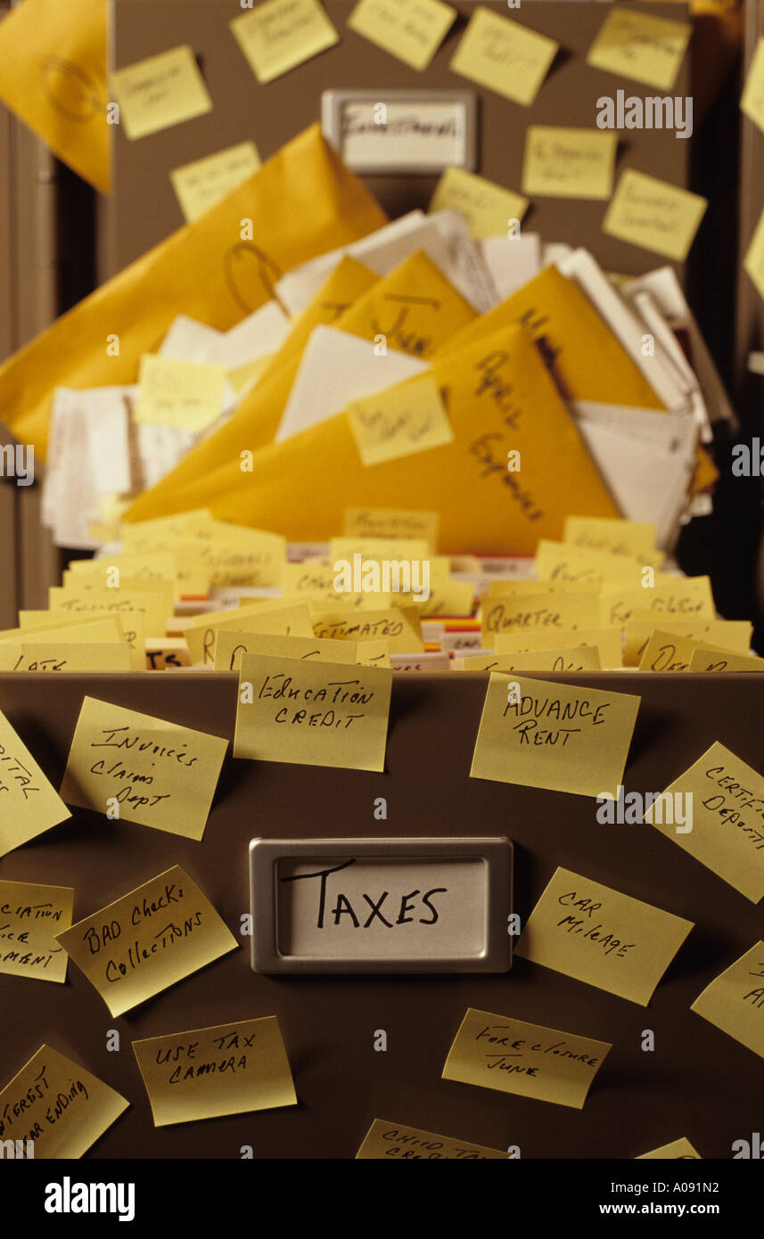 Filing cabinet overflowing hi-res stock photography and images - Alamy