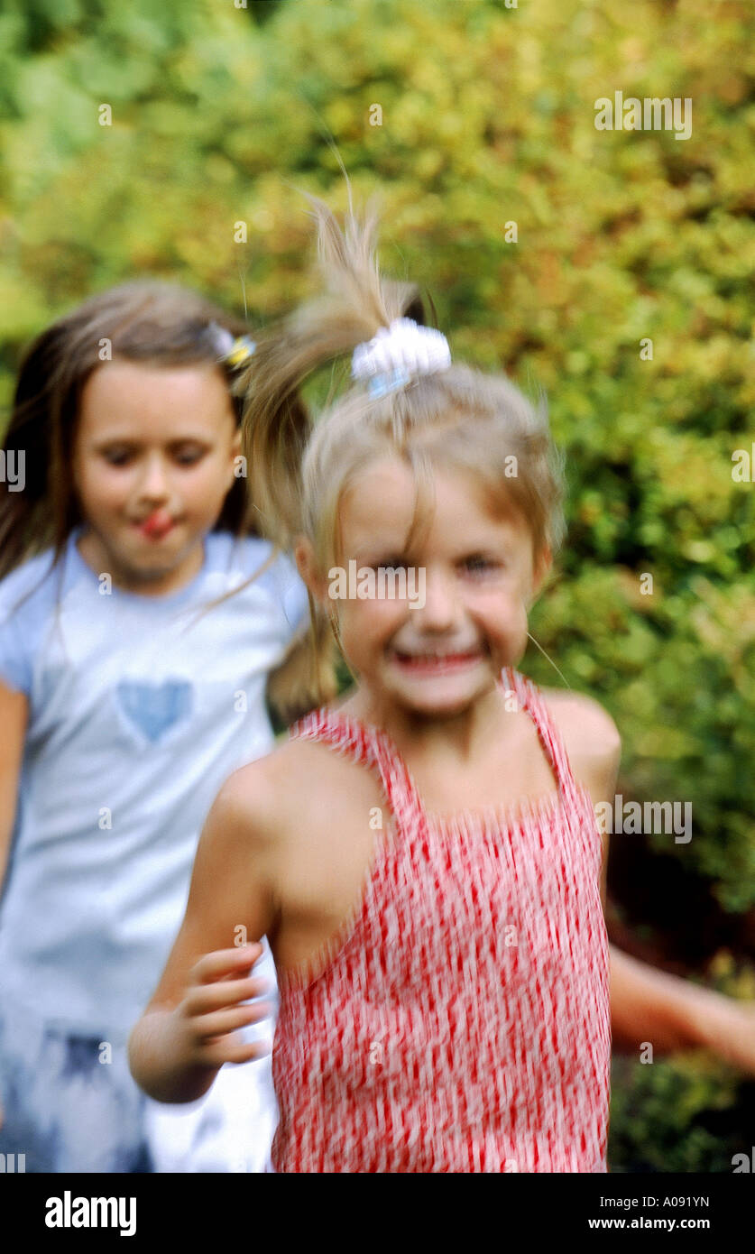 Smiling girl long hair running hi-res stock photography and images - Alamy