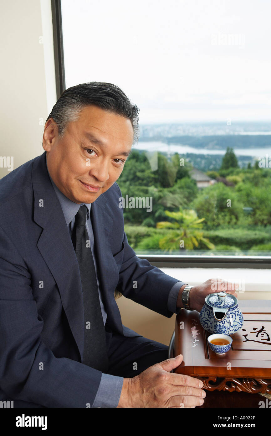 Senior chinese man drinking tea hi-res stock photography and images - Alamy