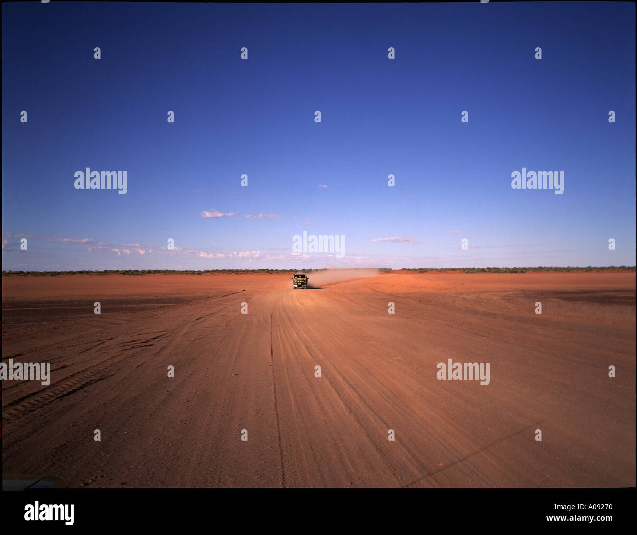lone vehicle ,wide dirt road ,australian outback Stock Photo - Alamy