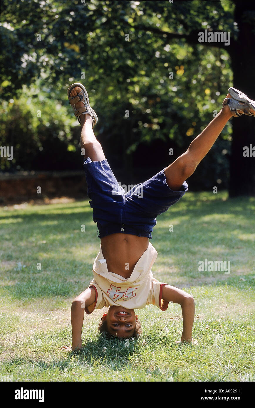 A boy doing the handstand Stock Photo - Alamy