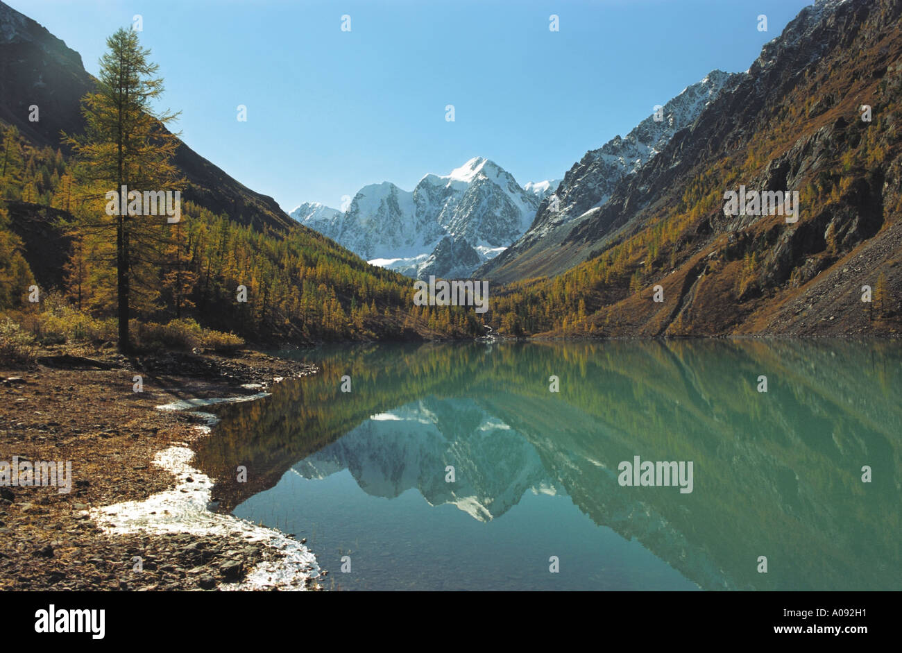 Lower Shavla Lake and the Northern Chuya Range reflected in its waters ...