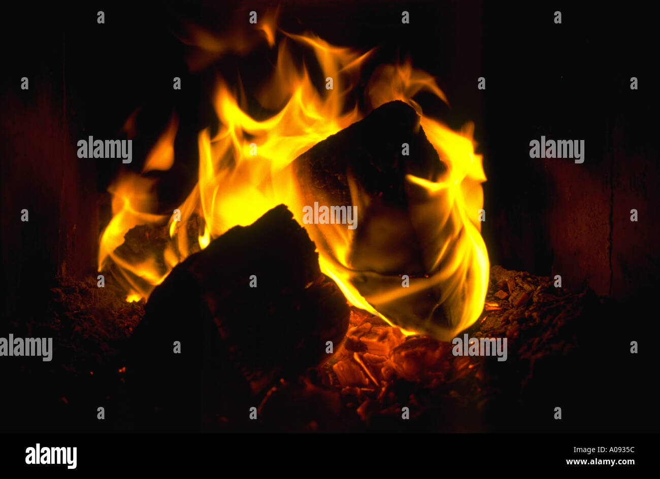 burning blocks of wood Stock Photo - Alamy