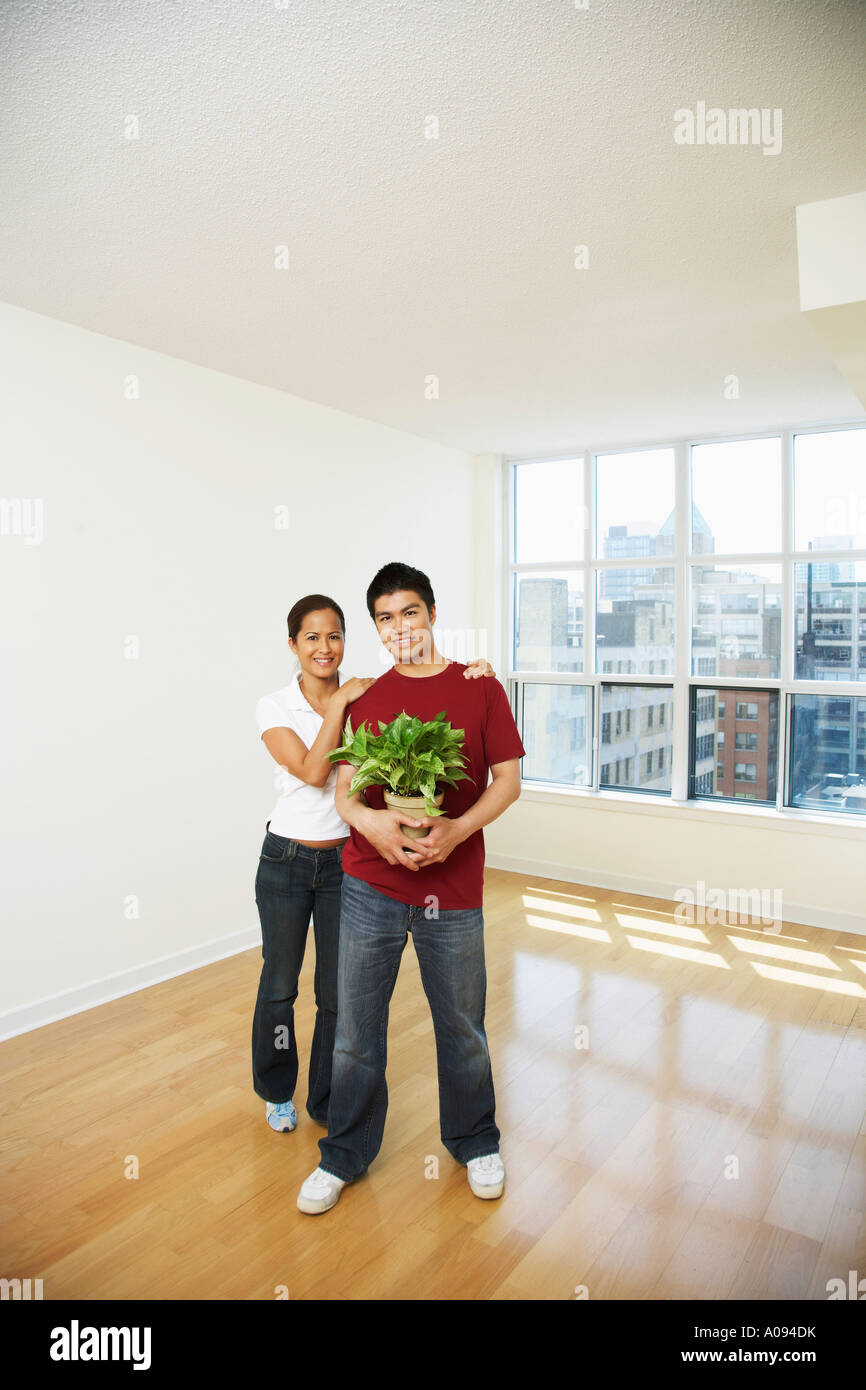 Couple in New Condo Stock Photo - Alamy