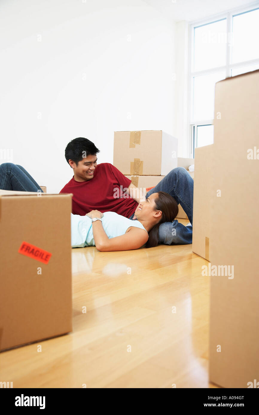 Tired couple boxes moving hi-res stock photography and images - Alamy