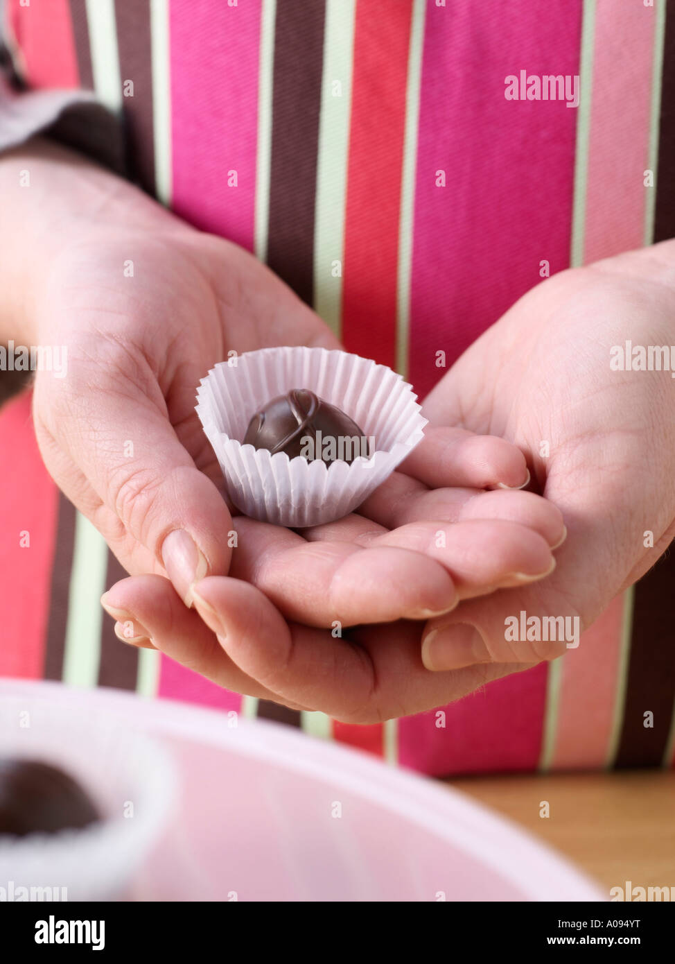 Woman's Hands holding Chocolate Stock Photo - Alamy