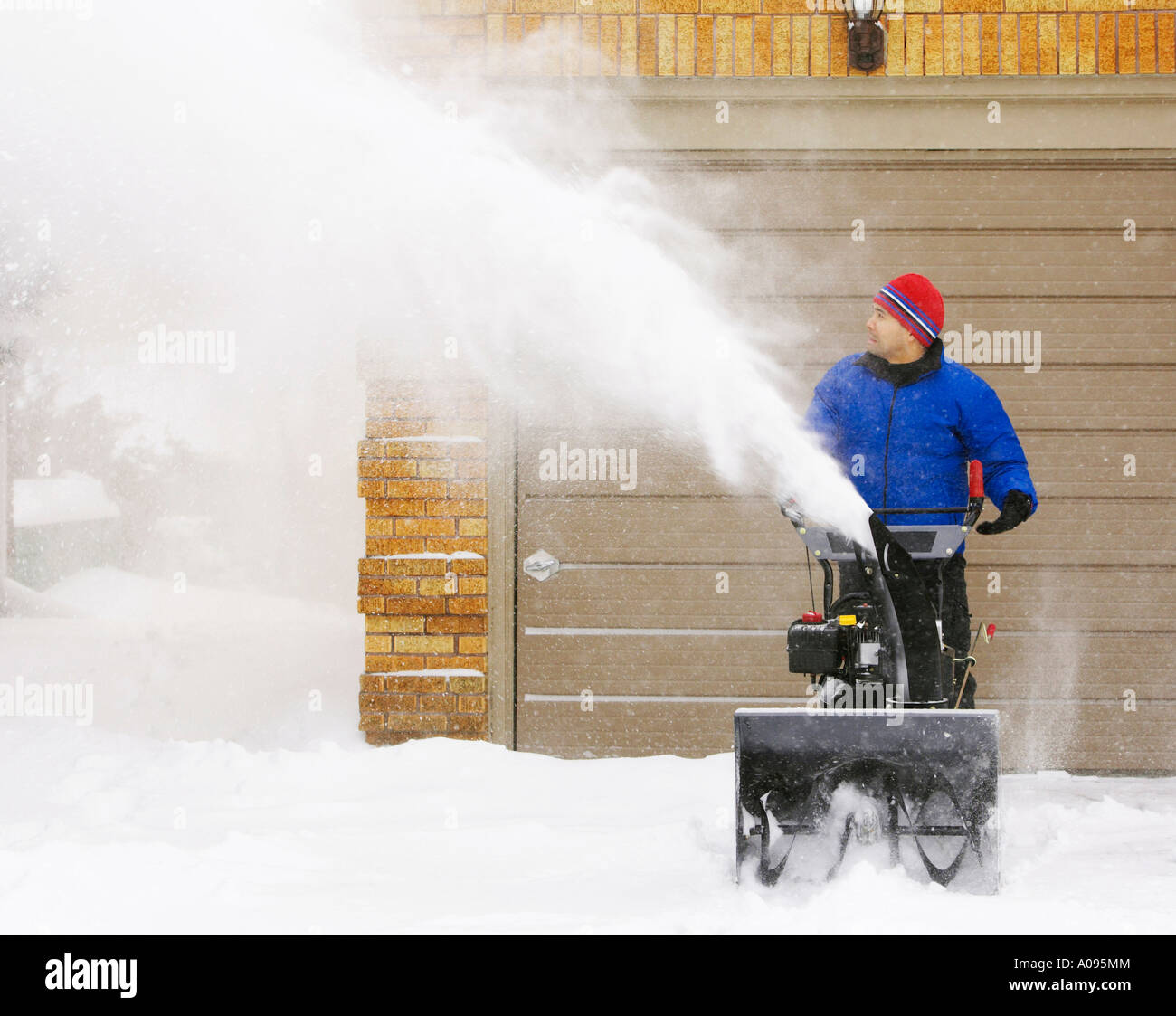 Man Using Snow Blower Stock Photo - Alamy