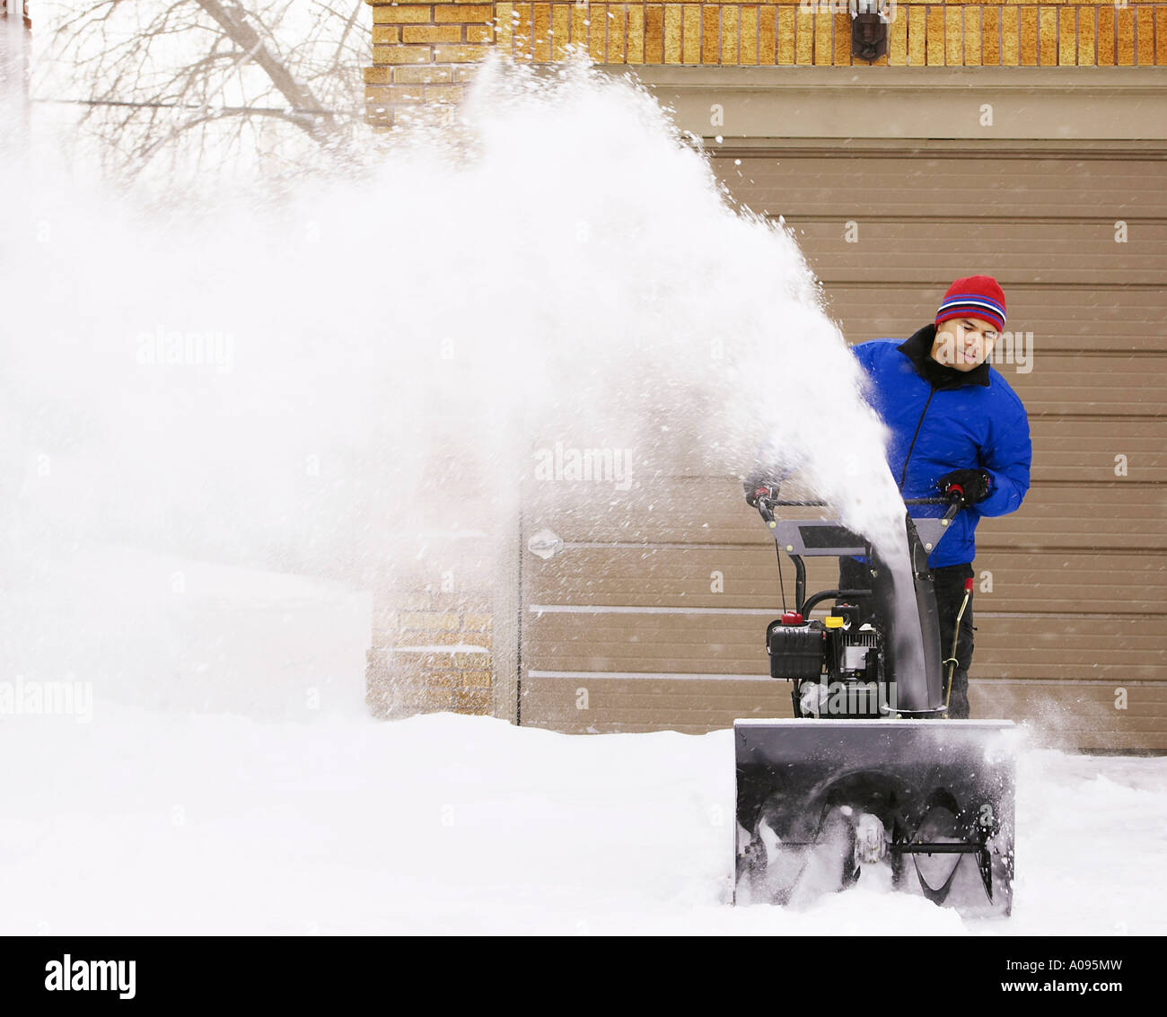 Man Using Snow Blower Stock Photo - Alamy