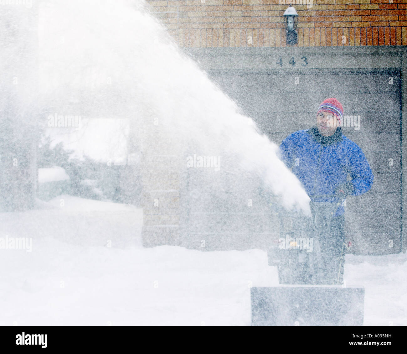Man Using Snow Blower Stock Photo - Alamy