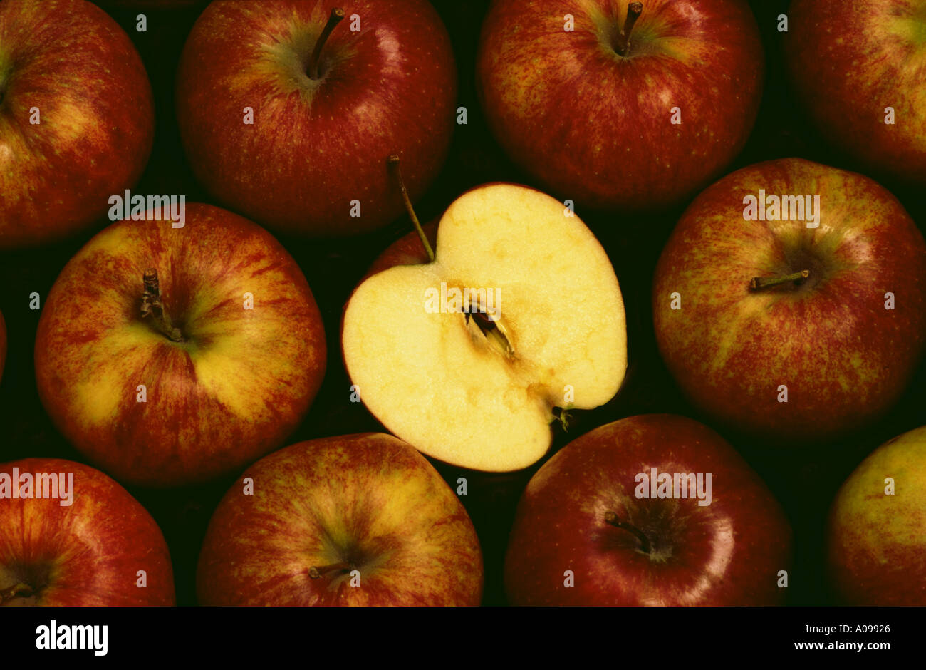 Red apples one half fresh fruits Stock Photo - Alamy