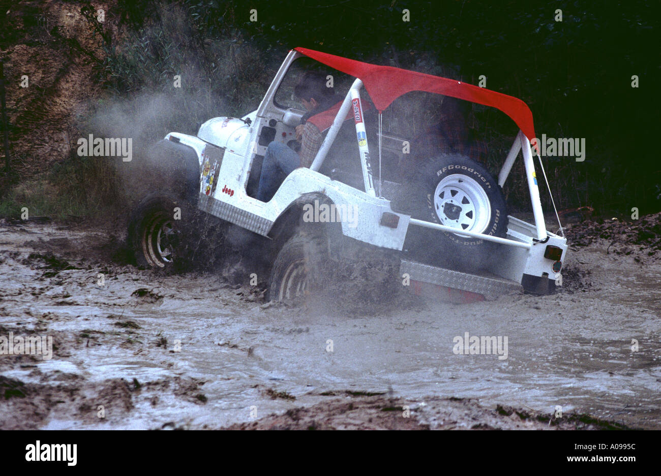 Jeep Wrangler Crossing Mud And Water Bad Road Conditions Stuck Off Road Driving Four Wheel