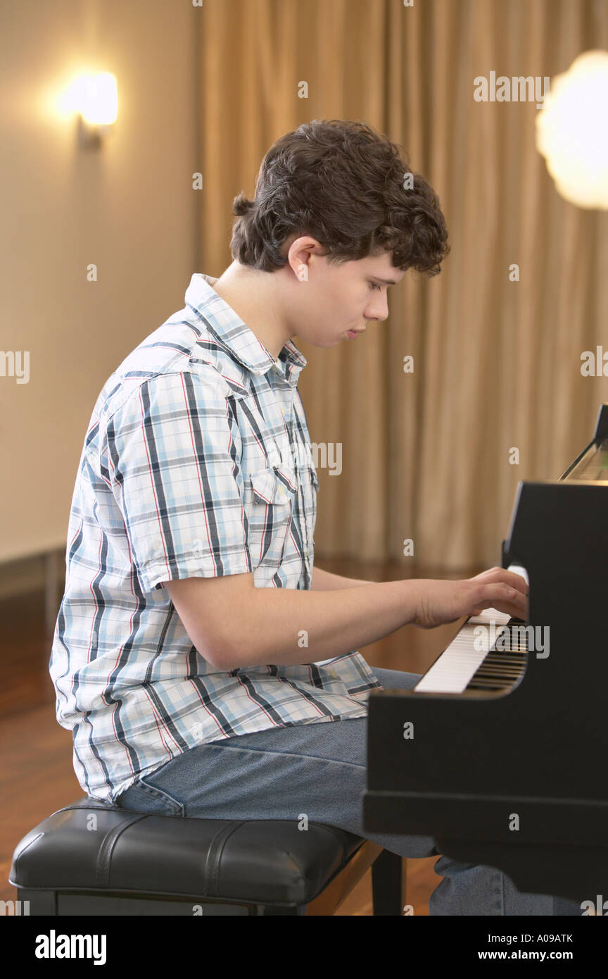 Boy Playing Piano At Recital High Resolution Stock Photography and ...