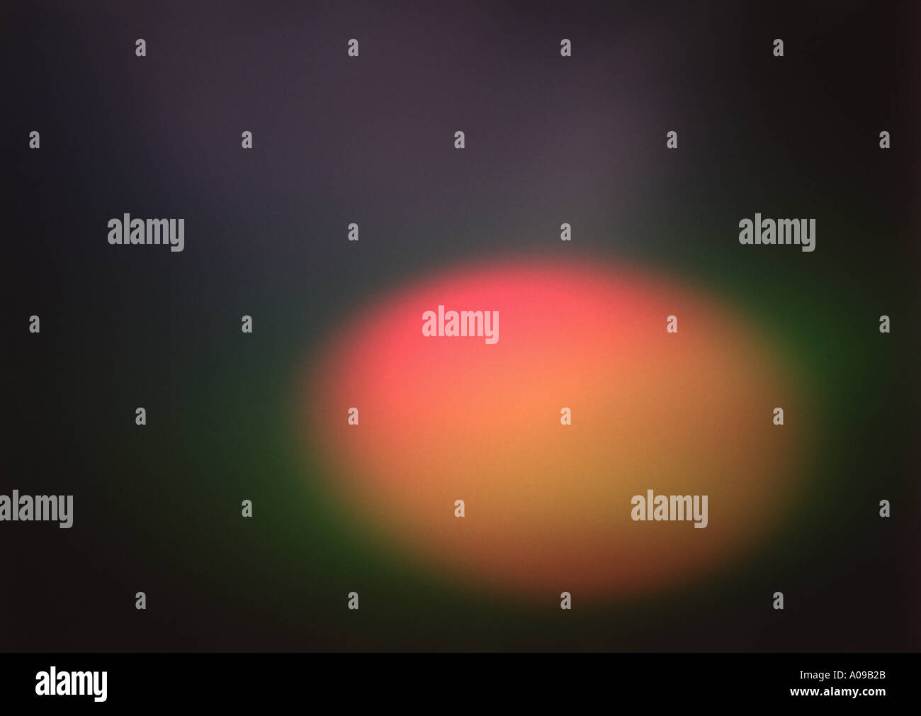 Orange, pink and green spotlight abstract light form Stock Photo - Alamy