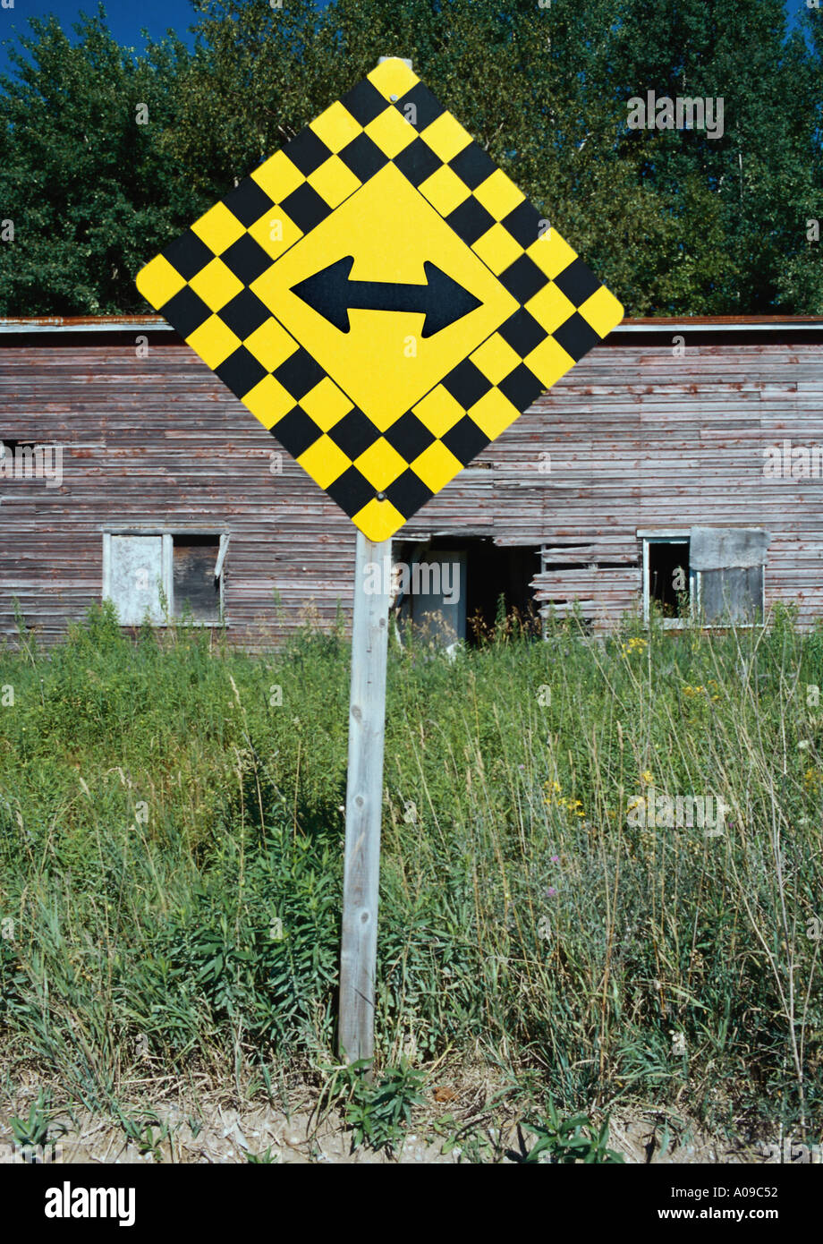 Checkered caution must turn left or right directional road sign Stock ...