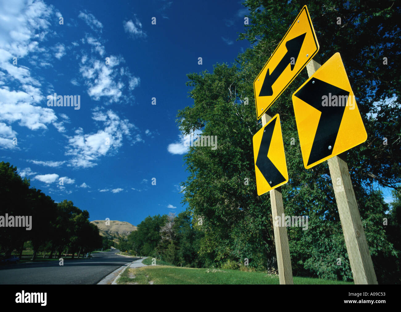 Three section must turn left or right sign Stock Photo - Alamy