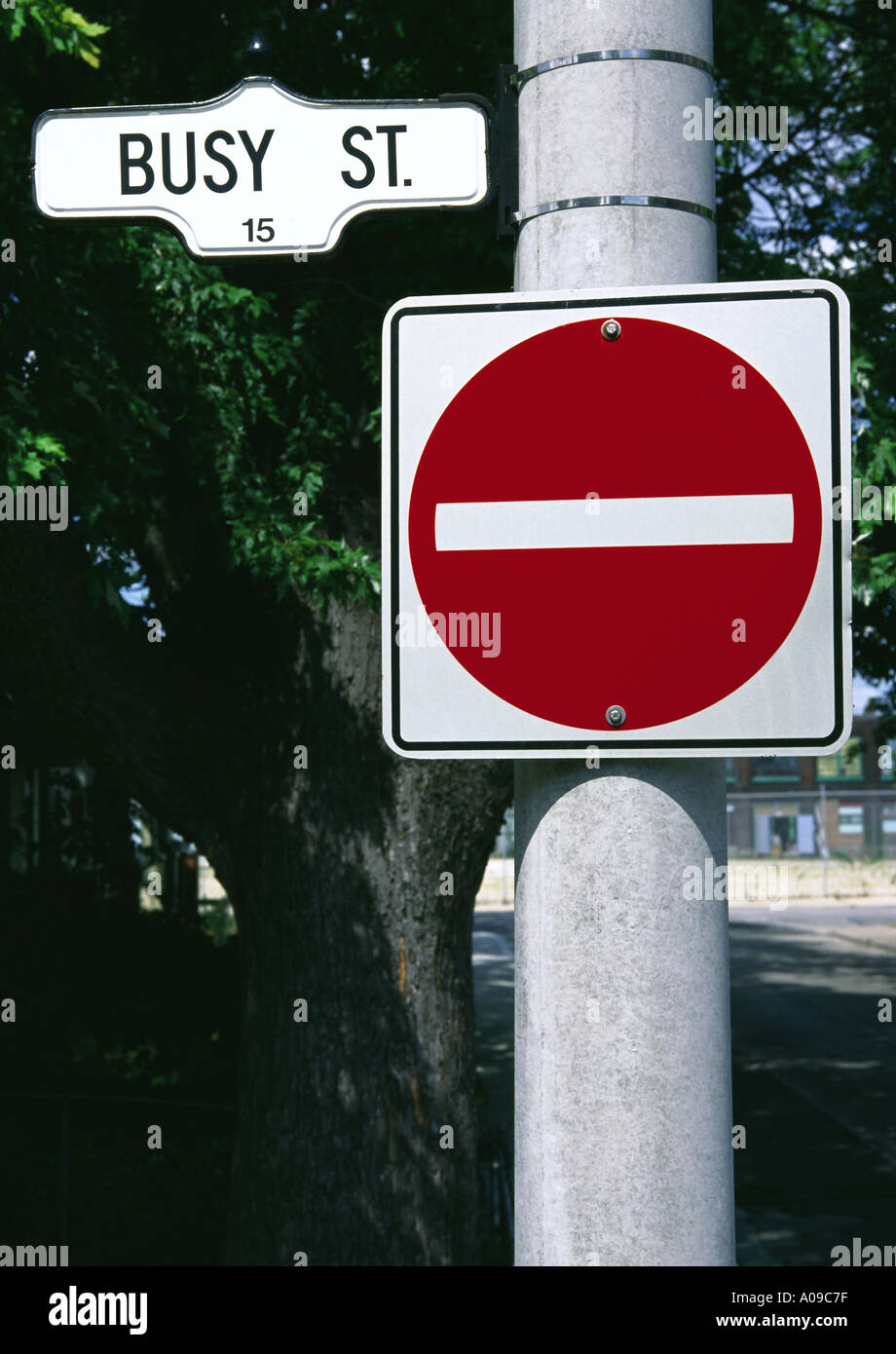 BUSY ST street sign with a no entry road sign below it Stock Photo - Alamy