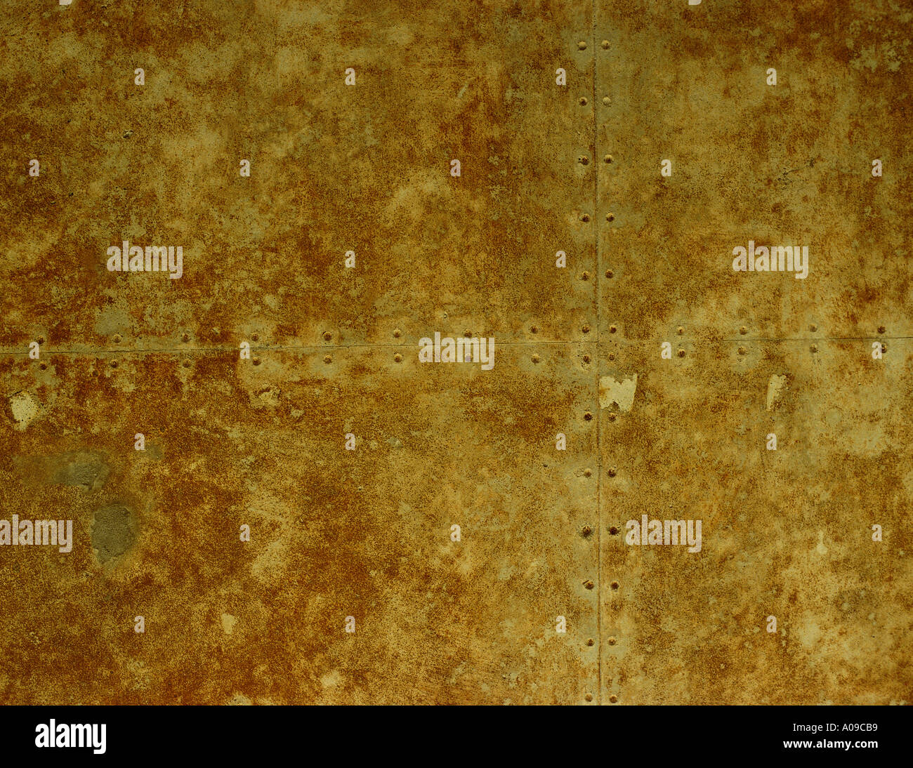 A close up of aged and weathered rusted metal riveted panels Stock ...