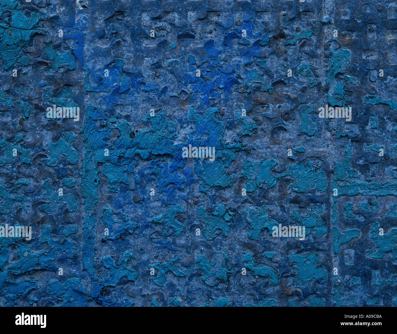 Aged and weathered metal surface with blue and green chipping cracking ...