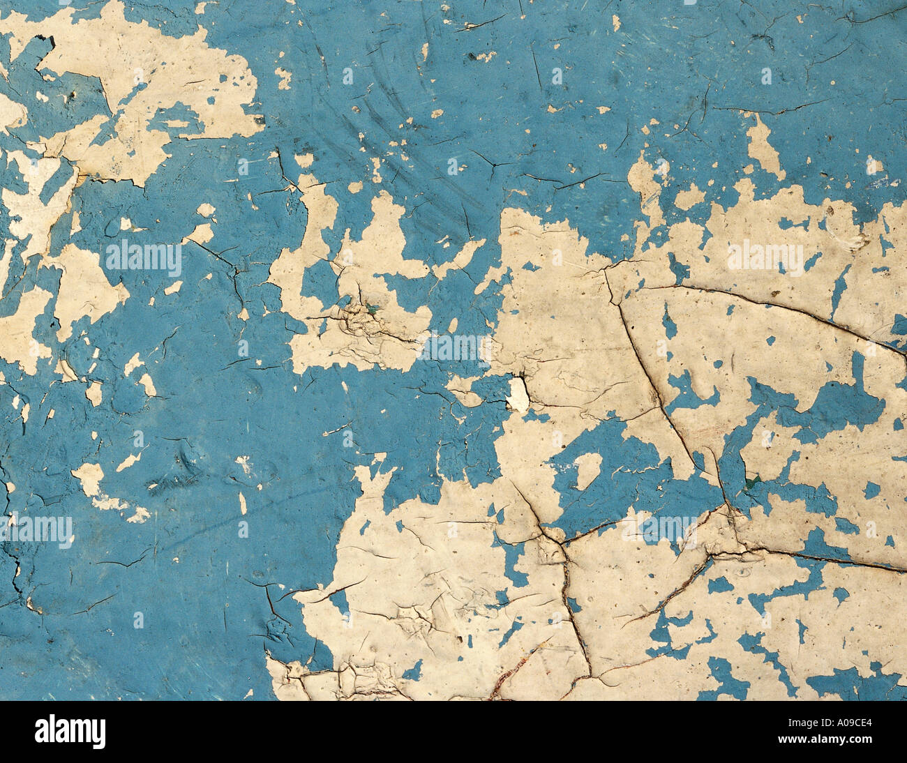 Aged and weathered stucco or plaster surface with chipping cracking ...