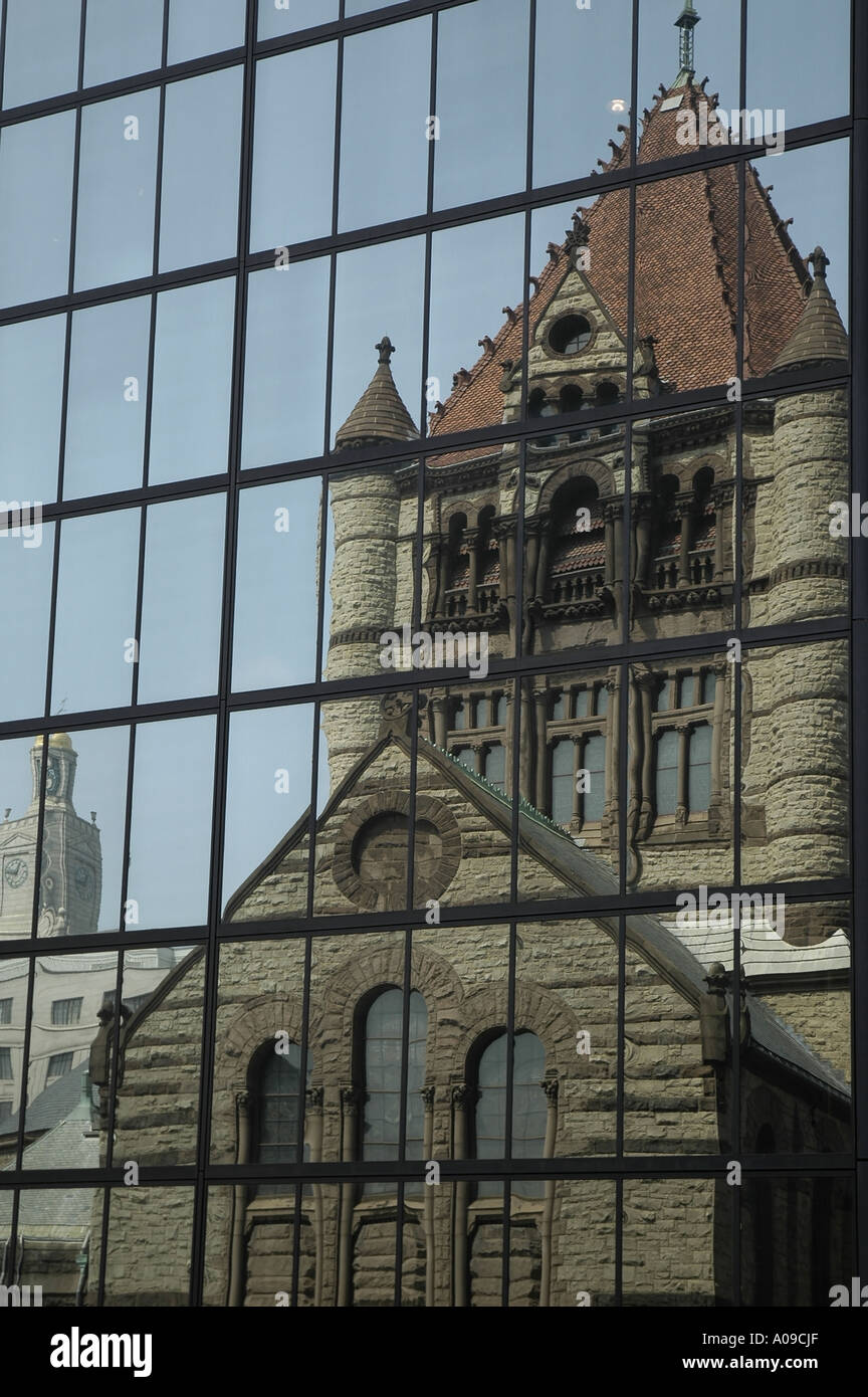 A view of Trinity Church, a reflection in the window of a nearby modern ...