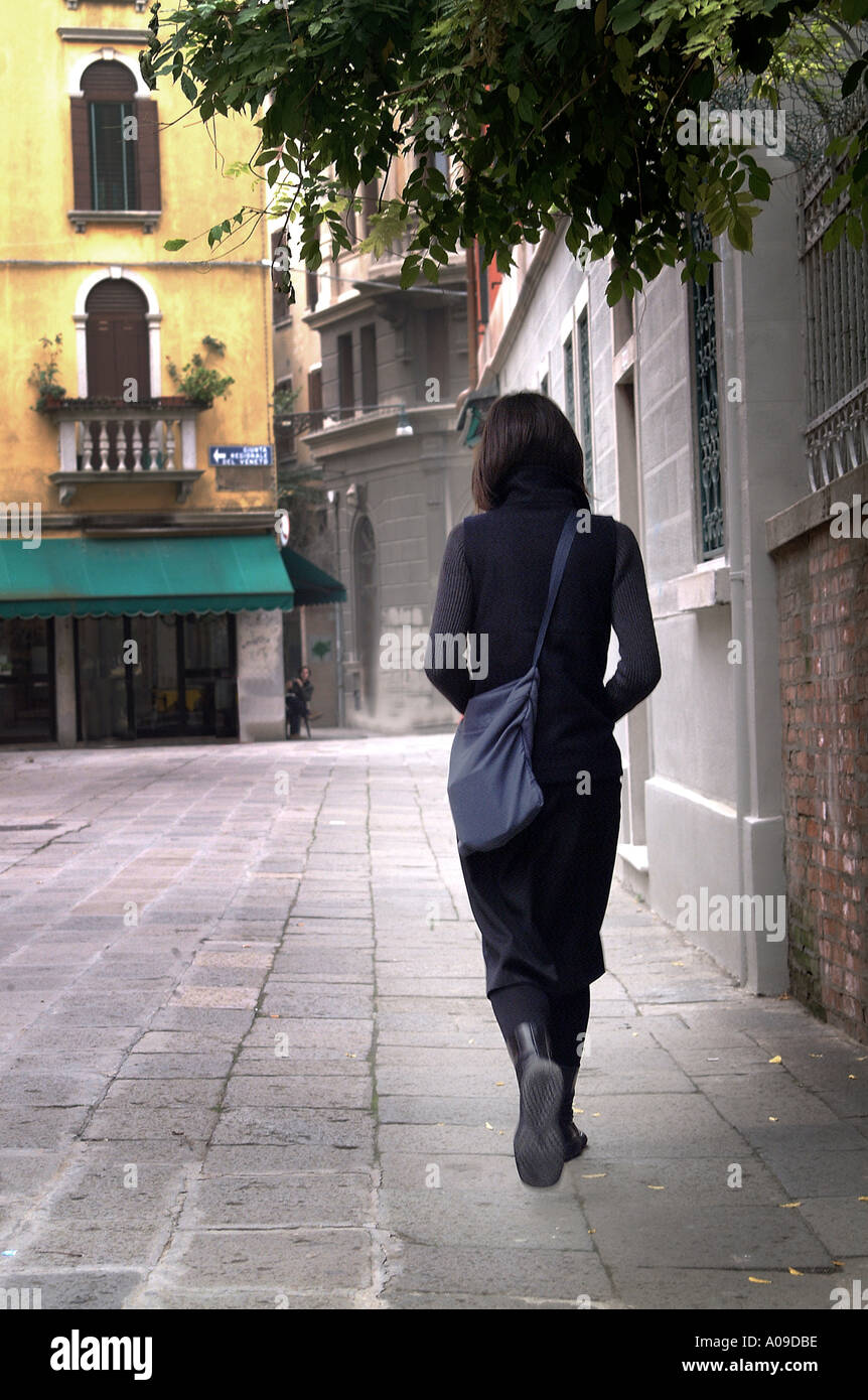 Walking to work in Venice Stock Photo - Alamy