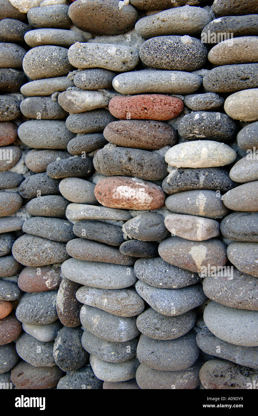 Pebbles - pebble wall , indonesian beach house Java Stock Photo - Alamy