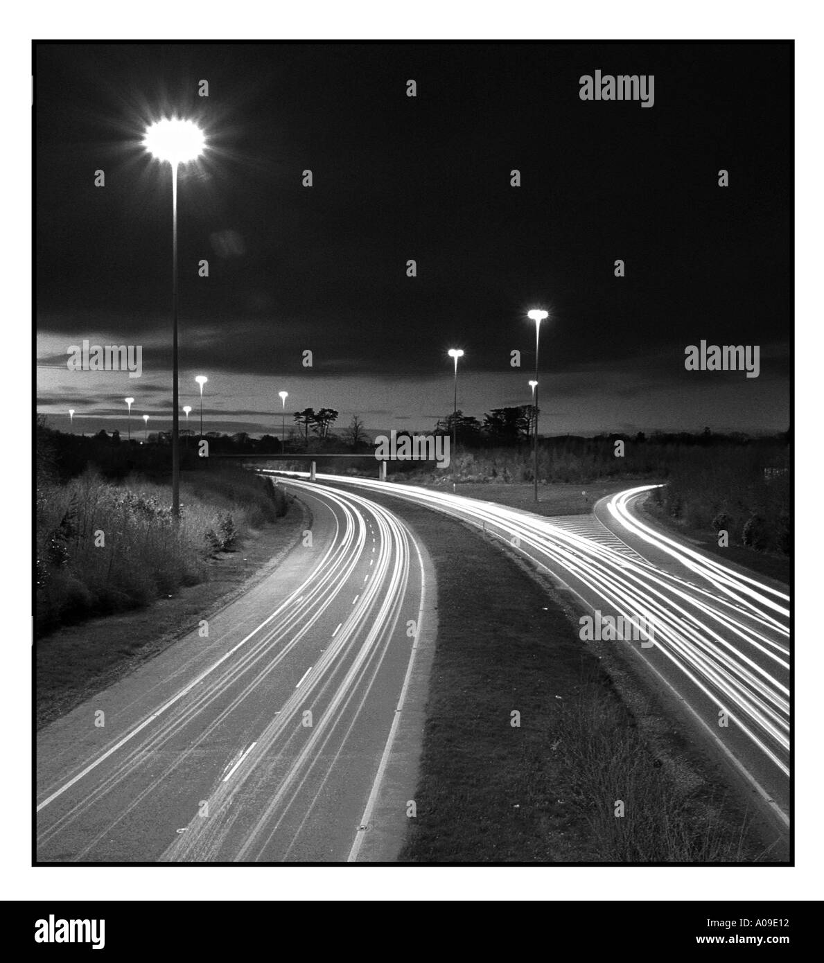 Road at night Stock Photo - Alamy