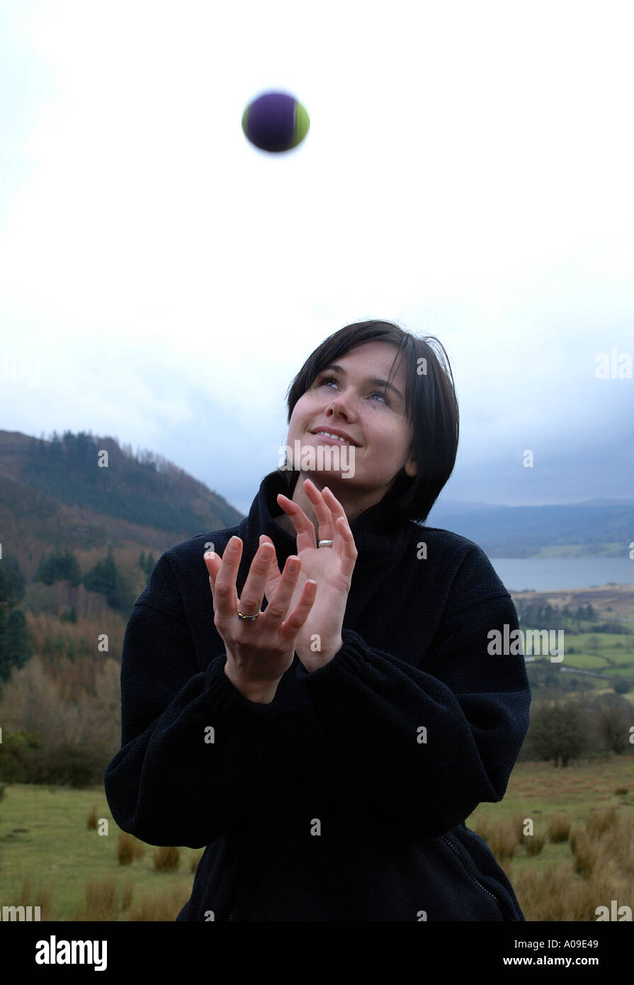 catch female beautiful brunette Stock Photo - Alamy