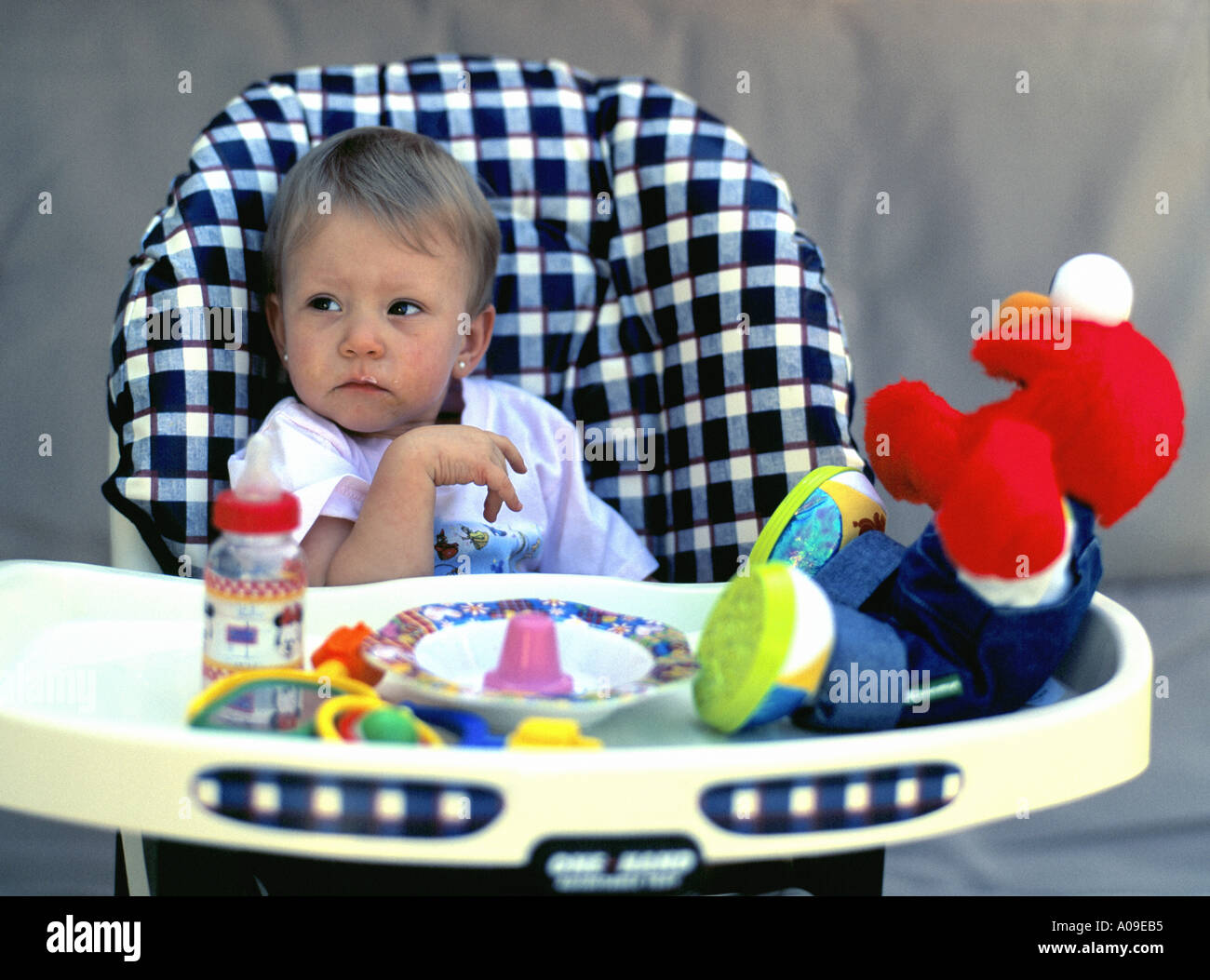 Baby Girl at Eating Table Stock Photo - Alamy