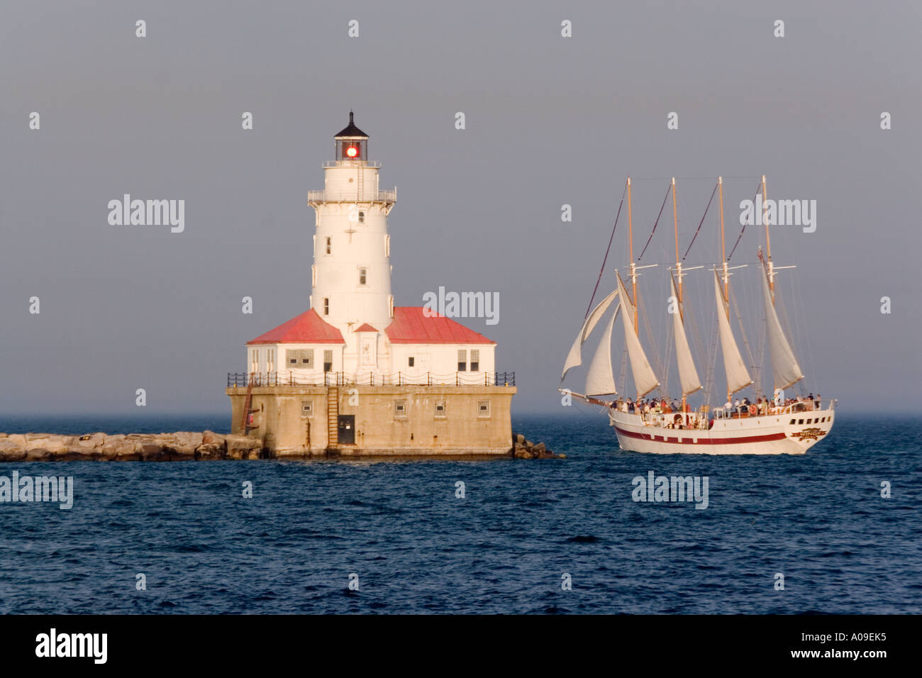 Chicago Harbor Lighthouse with tall ship, "Windy Stock Photo - Alamy