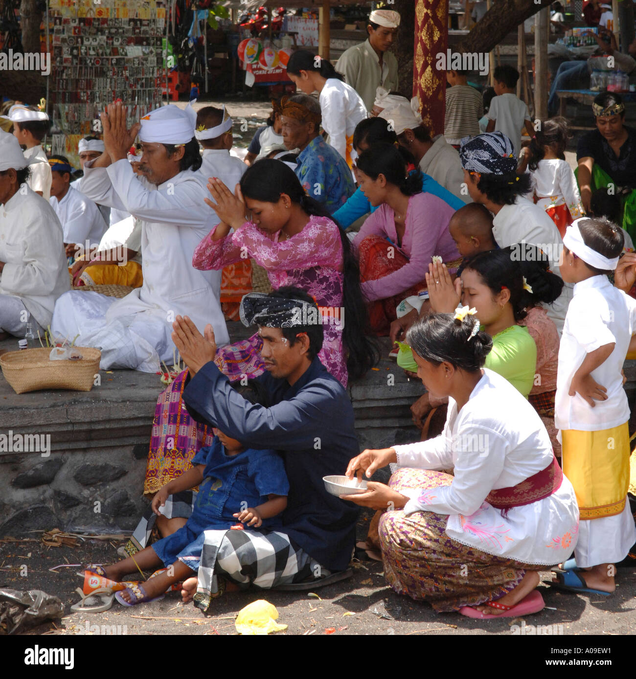 Balinese families praying at open air hindu religious festival, Bali ...