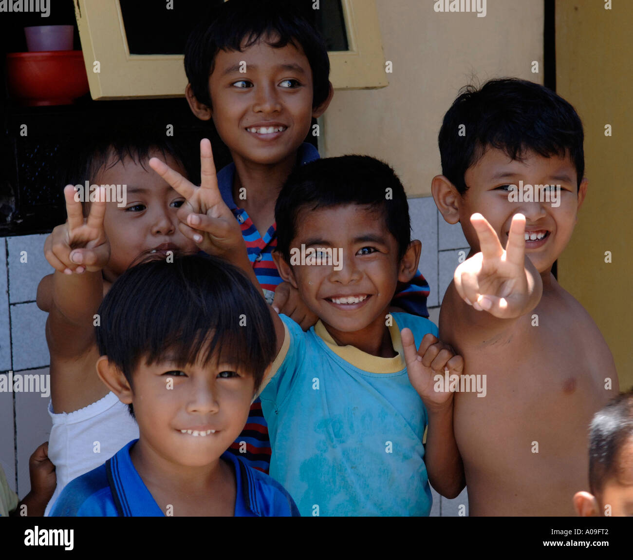 Balinese school children pose for the camera, Singararja Bali ...