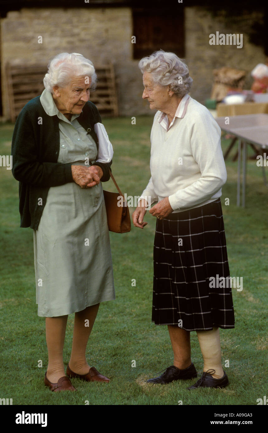 Two female elderly ladies old age pensioners gossip HOMER SYKES Stock ...
